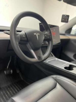 White Tesla Model Y 2023 in Klaipeda, with an engine capacity of 0.00 L and mileage of 218 thousand km for 22264 €, photo 8 on AUTOMOTO.COM.LV