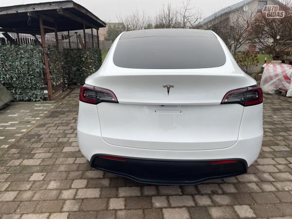 Balts Tesla Model Y 2023 Viļņa, ar dzinēja tilpumu 0.00 L un nobraukumu 47 tūkst. km par 24500 €, foto 2 vietnē AUTOMOTO.COM.LV