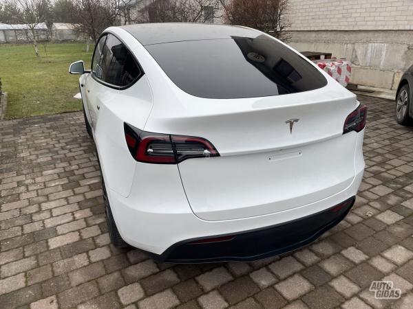 Balts Tesla Model Y 2023 Viļņa, ar dzinēja tilpumu 0.00 L un nobraukumu 47 tūkst. km par 24500 €, foto 3 vietnē AUTOMOTO.COM.LV