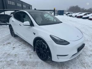 White Tesla Model Y 2023 in Vilnius, with an engine capacity of 0.00 L and mileage of 62 thousand km for 33500 €, photo 3 on AUTOMOTO.COM.LV