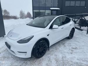 White Tesla Model Y 2023 in Vilnius, with an engine capacity of 0.00 L and mileage of 62 thousand km for 33500 €, photo 4 on AUTOMOTO.COM.LV