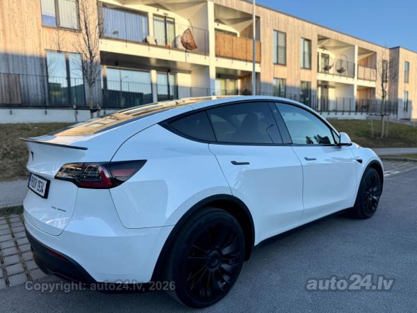 Balts Tesla Model Y 2023 Tallina, ar dzinēja tilpumu 0.00 L un nobraukumu 94 tūkst. km par 33900 €, foto 7 vietnē AUTOMOTO.COM.LV