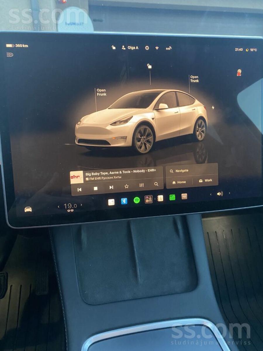 White Tesla Model Y 2023 in Riga, with an engine capacity of 0.00 L and mileage of 84 thousand km for 31500 €, photo 8 on AUTOMOTO.COM.LV