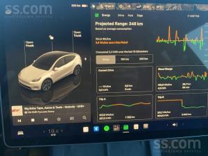 White Tesla Model Y 2023 in Riga, with an engine capacity of 0.00 L and mileage of 84 thousand km for 31500 €, photo 10 on AUTOMOTO.COM.LV