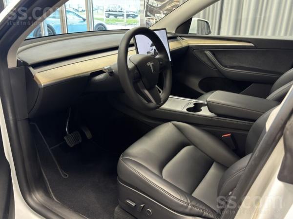 Balts Tesla Model Y 2023 Rīga, ar dzinēja tilpumu 0.00 L un nobraukumu 77 tūkst. km par 31990 €, foto 8 vietnē AUTOMOTO.COM.LV