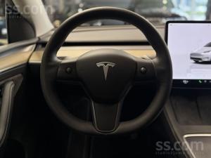 White Tesla Model Y 2023 in Riga, with an engine capacity of 0.00 L and mileage of 77 thousand km for 31990 €, photo 15 on AUTOMOTO.COM.LV