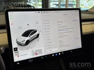 White Tesla Model Y 2023 in Riga, with an engine capacity of 0.00 L and mileage of 77 thousand km for 31990 €, photo 19 on AUTOMOTO.COM.LV