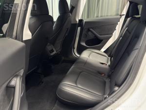 White Tesla Model Y 2023 in Riga, with an engine capacity of 0.00 L and mileage of 77 thousand km for 31990 €, photo 23 on AUTOMOTO.COM.LV