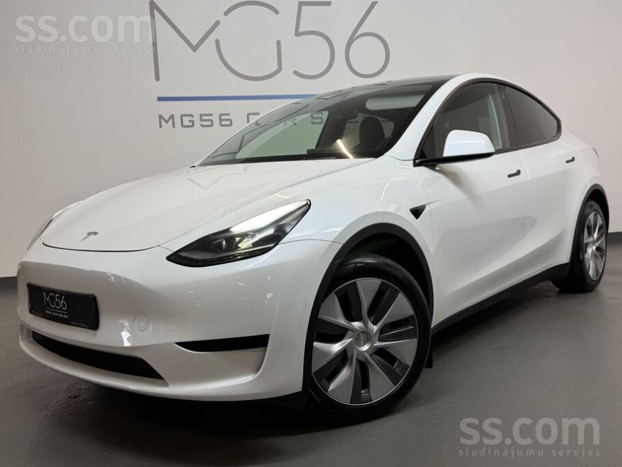 White Tesla Model Y 2023 in Riga, with an engine capacity of 0.00 L and mileage of 19 thousand km for 32900 €, photo 1 on AUTOMOTO.COM.LV