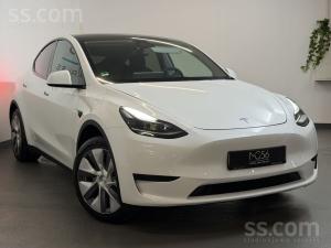 White Tesla Model Y 2023 in Riga, with an engine capacity of 0.00 L and mileage of 19 thousand km for 32900 €, photo 3 on AUTOMOTO.COM.LV