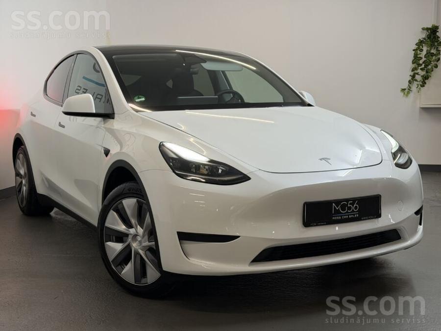 White Tesla Model Y 2023 in Riga, with an engine capacity of 0.00 L and mileage of 19 thousand km for 32900 €, photo 3 on AUTOMOTO.COM.LV