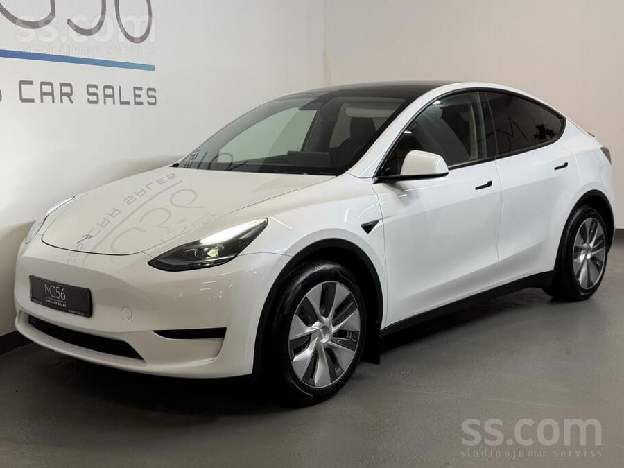 White Tesla Model Y 2023 in Riga, with an engine capacity of 0.00 L and mileage of 19 thousand km for 32900 €, photo 4 on AUTOMOTO.COM.LV