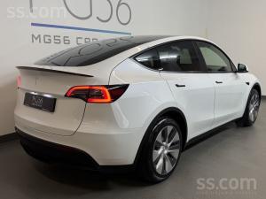 White Tesla Model Y 2023 in Riga, with an engine capacity of 0.00 L and mileage of 19 thousand km for 32900 €, photo 6 on AUTOMOTO.COM.LV