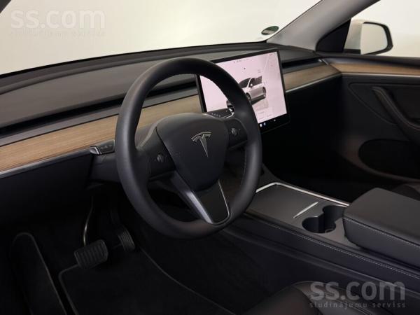 Balts Tesla Model Y 2023 Rīga, ar dzinēja tilpumu 0.00 L un nobraukumu 19 tūkst. km par 32900 €, foto 6 vietnē AUTOMOTO.COM.LV