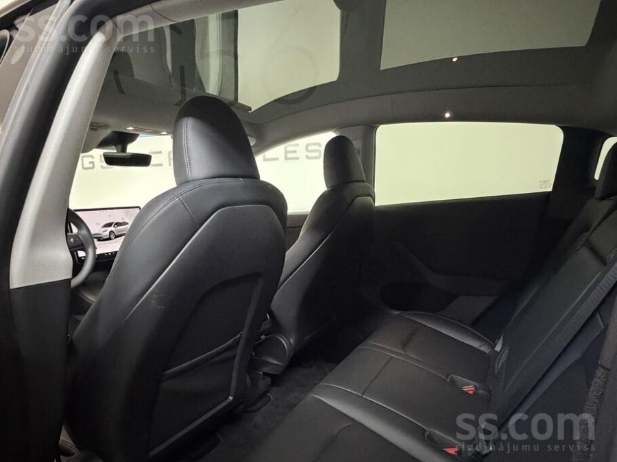 White Tesla Model Y 2023 in Riga, with an engine capacity of 0.00 L and mileage of 19 thousand km for 32900 €, photo 11 on AUTOMOTO.COM.LV