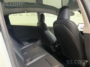 White Tesla Model Y 2023 in Riga, with an engine capacity of 0.00 L and mileage of 19 thousand km for 32900 €, photo 12 on AUTOMOTO.COM.LV