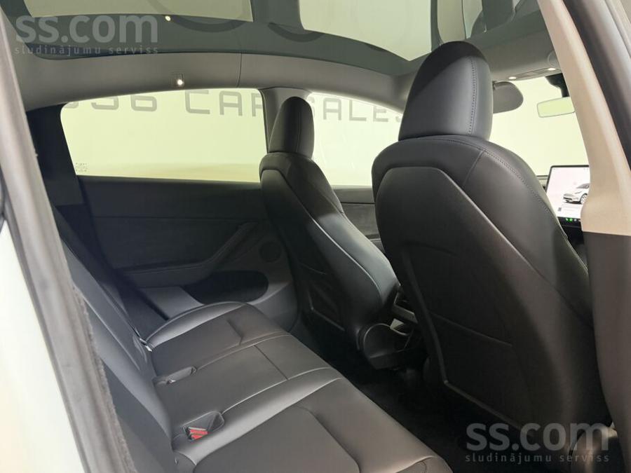 White Tesla Model Y 2023 in Riga, with an engine capacity of 0.00 L and mileage of 19 thousand km for 32900 €, photo 12 on AUTOMOTO.COM.LV