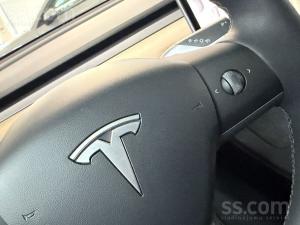 White Tesla Model Y 2023 in Riga, with an engine capacity of 0.00 L and mileage of 19 thousand km for 32900 €, photo 14 on AUTOMOTO.COM.LV