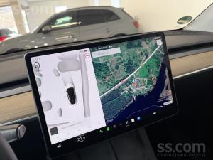 White Tesla Model Y 2023 in Riga, with an engine capacity of 0.00 L and mileage of 19 thousand km for 32900 €, photo 15 on AUTOMOTO.COM.LV