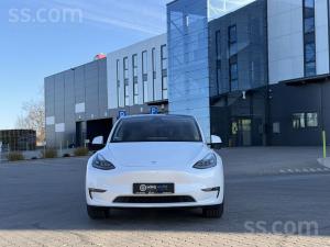 White Tesla Model Y 2023 in Riga, with an engine capacity of 0.00 L and mileage of 58 thousand km for 38900 €, photo  on AUTOMOTO.COM.LV