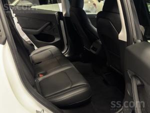 White Tesla Model Y 2023 in Riga, with an engine capacity of 0.00 L and mileage of 77 thousand km for 31990 €, photo 24 on AUTOMOTO.COM.LV