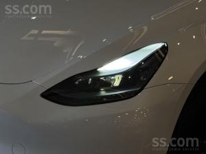 White Tesla Model Y 2023 in Riga, with an engine capacity of 0.00 L and mileage of 77 thousand km for 31990 €, photo 26 on AUTOMOTO.COM.LV