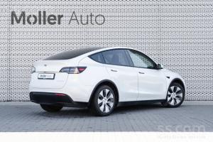 Balts Tesla Model Y 2023 Rīga, ar dzinēja tilpumu 0.00 L un nobraukumu 76 tūkst. km par 40900 €, foto 5 vietnē AUTOMOTO.COM.LV