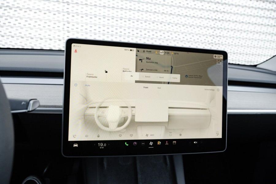 Balts Tesla Model Y 2023 Mārupe, ar dzinēja tilpumu 0.00 L un nobraukumu 760 tūkst. km par 40900 €, foto 12 vietnē AUTOMOTO.COM.LV