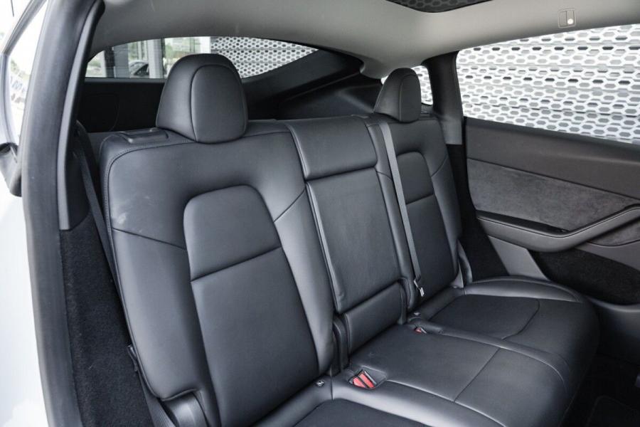 Balts Tesla Model Y 2023 Mārupe, ar dzinēja tilpumu 0.00 L un nobraukumu 760 tūkst. km par 40900 €, foto 16 vietnē AUTOMOTO.COM.LV