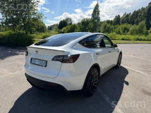 Balts Tesla Model Y 2023 Rīga, ar dzinēja tilpumu 0.00 L un nobraukumu 60 tūkst. km par 33000 €, foto 4 vietnē AUTOMOTO.COM.LV