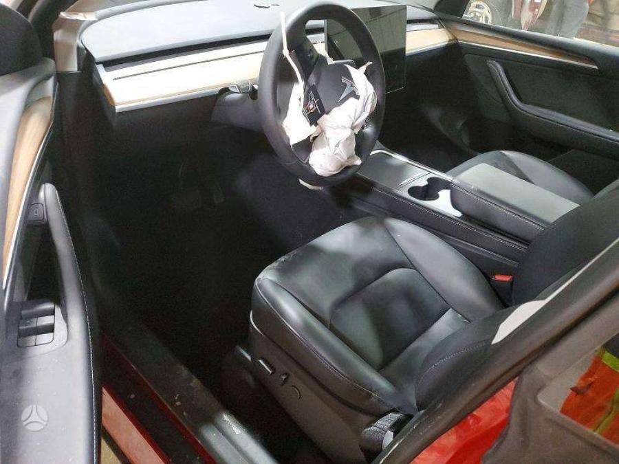 White Tesla Model Y 2023 in Vilnius, with an engine capacity of 0.00 L and mileage of 44 thousand km for 19500 €, photo 9 on AUTOMOTO.COM.LV