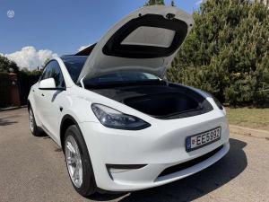 White Tesla Model Y 2023 in Kaunas, with an engine capacity of 0.00 L and mileage of 52 thousand km for 37700 €, photo 4 on AUTOMOTO.COM.LV