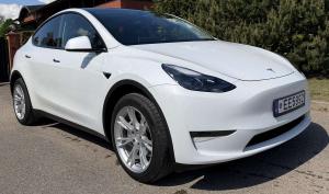 White Tesla Model Y 2023 in Kaunas, with an engine capacity of 0.00 L and mileage of 52 thousand km for 37700 €, photo 5 on AUTOMOTO.COM.LV