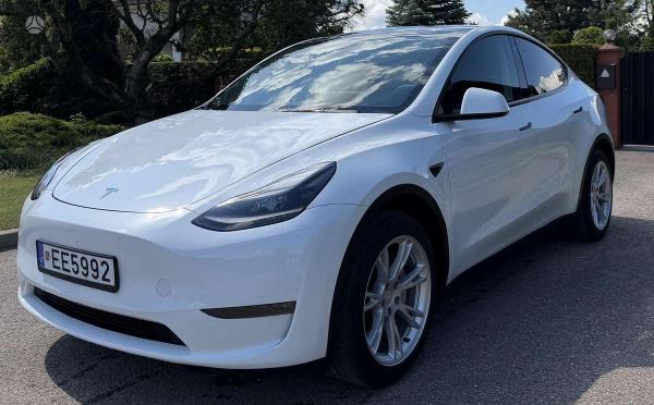 White Tesla Model Y 2023 in Kaunas, with an engine capacity of 0.00 L and mileage of 52 thousand km for 37700 €, photo 6 on AUTOMOTO.COM.LV