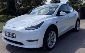 White Tesla Model Y 2023 in Kaunas, with an engine capacity of 0.00 L and mileage of 52 thousand km for 37700 €, photo 7 on AUTOMOTO.COM.LV