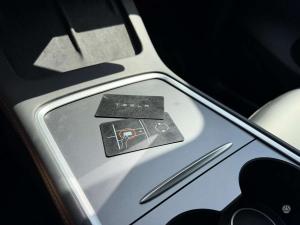 White Tesla Model Y 2023 in Kaunas, with an engine capacity of 0.00 L and mileage of 52 thousand km for 37700 €, photo 22 on AUTOMOTO.COM.LV