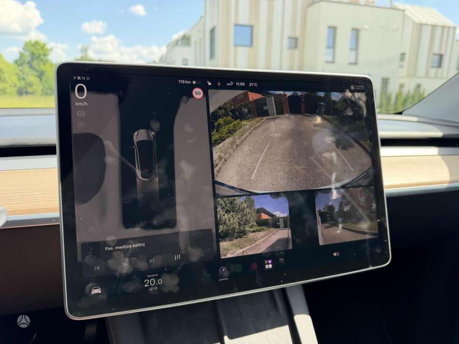 White Tesla Model Y 2023 in Kaunas, with an engine capacity of 0.00 L and mileage of 52 thousand km for 37700 €, photo 27 on AUTOMOTO.COM.LV