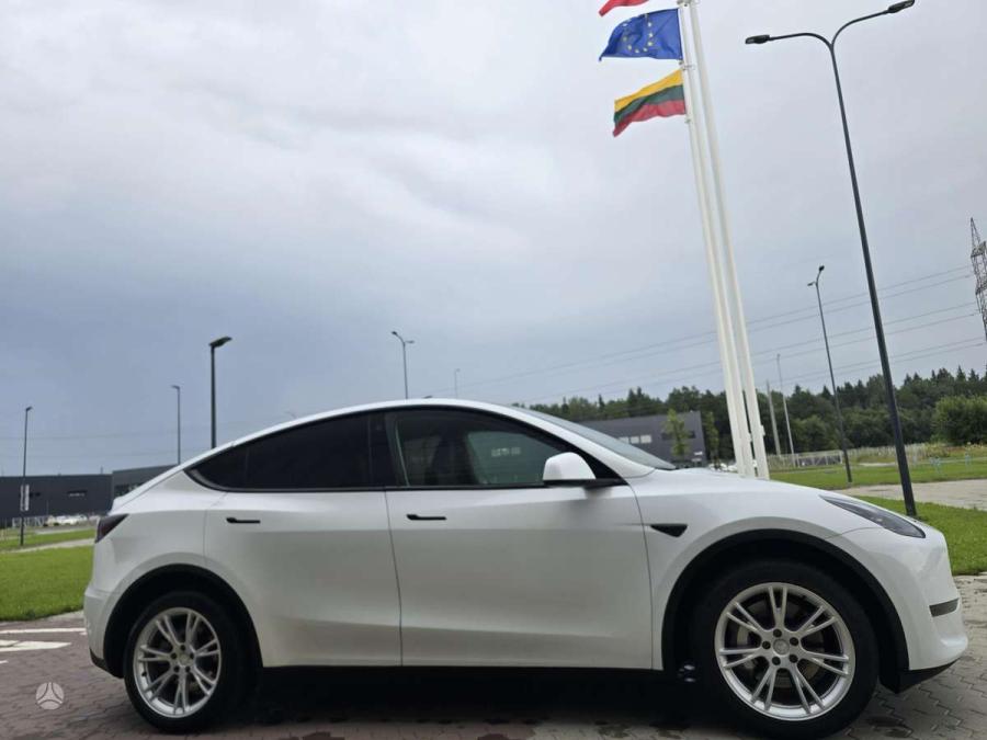 Balts Tesla Model Y 2023 Klaipėda, ar dzinēja tilpumu 0.00 L un nobraukumu 52 tūkst. km par 32500 €, foto 9 vietnē AUTOMOTO.COM.LV