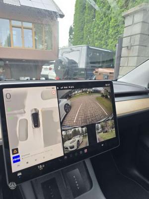 Balts Tesla Model Y 2023 Klaipėda, ar dzinēja tilpumu 0.00 L un nobraukumu 52 tūkst. km par 32500 €, foto 23 vietnē AUTOMOTO.COM.LV