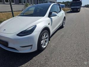 Balts Tesla Model Y 2023 Viļņa, ar dzinēja tilpumu 0.00 L un nobraukumu 111 tūkst. km par 33999 €, foto  vietnē AUTOMOTO.COM.LV