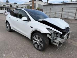 Balts Tesla Model Y 2023 Kauņa, ar dzinēja tilpumu 0.00 L un nobraukumu 90 tūkst. km par 23490 €, foto  vietnē AUTOMOTO.COM.LV