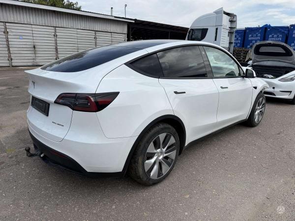 Balts Tesla Model Y 2023 Kauņa, ar dzinēja tilpumu 0.00 L un nobraukumu 90 tūkst. km par 23490 €, foto 2 vietnē AUTOMOTO.COM.LV