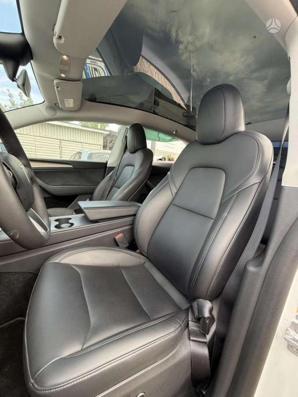 Balts Tesla Model Y 2023 Kauņa, ar dzinēja tilpumu 0.00 L un nobraukumu 77 tūkst. km par 22990 €, foto 8 vietnē AUTOMOTO.COM.LV