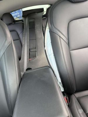 White Tesla Model Y 2023 in Kaunas, with an engine capacity of 0.00 L and mileage of 77 thousand km for 22990 €, photo 13 on AUTOMOTO.COM.LV