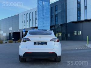 Белый Тесла Модель Y 2023 в Рига, объемом двигателя 0.00 л и пробегом 65 тыс. км за 37900 €, фото 5 на AUTOMOTO.COM.LV
