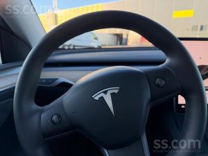 Белый Тесла Модель Y 2023 в Рига, объемом двигателя 0.00 л и пробегом 65 тыс. км за 37900 €, фото 7 на AUTOMOTO.COM.LV