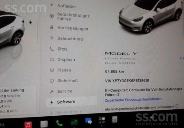 White Tesla Model Y 2023 in Riga, with an engine capacity of 0.00 L and mileage of 65 thousand km for 37900 €, photo 9 on AUTOMOTO.COM.LV