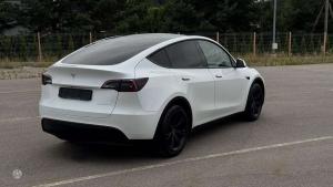 Balts Tesla Model Y 2023 Viļņa, ar dzinēja tilpumu 0.00 L un nobraukumu 116 tūkst. km par 35000 €, foto 4 vietnē AUTOMOTO.COM.LV