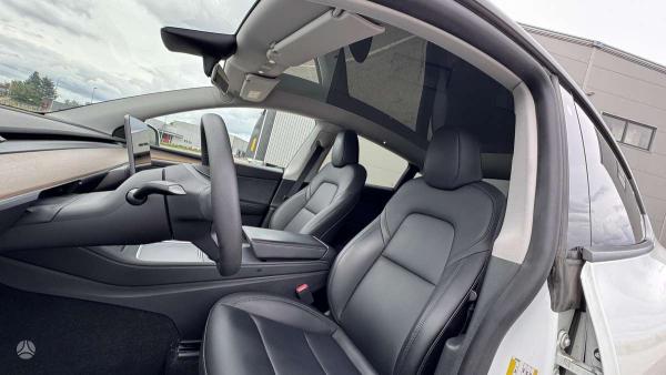 White Tesla Model Y 2023 in Vilnius, with an engine capacity of 0.00 L and mileage of 116 thousand km for 35000 €, photo 7 on AUTOMOTO.COM.LV