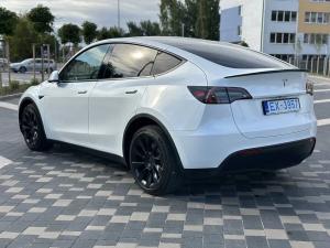 White Tesla Model Y 2023 in Jelgava, with an engine capacity of 0.00 L and mileage of 89 thousand km for 38000 €, photo 4 on AUTOMOTO.COM.LV